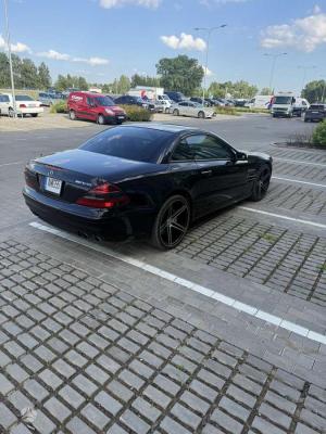 Black Mercedes-Benz SL 55 AMG 2005 in Vilnius, with an engine capacity of 5.44 L and mileage of 165 thousand km for 17000 €, photo  on AUTOMOTO.COM.LV