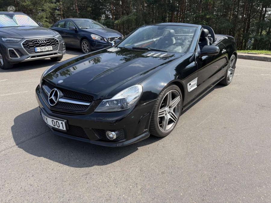 Black Mercedes-Benz SL 63 AMG 2009 in Vilnius, with an engine capacity of 6.21 L and mileage of 184 thousand km for 45000 €, photo 1 on AUTOMOTO.COM.LV