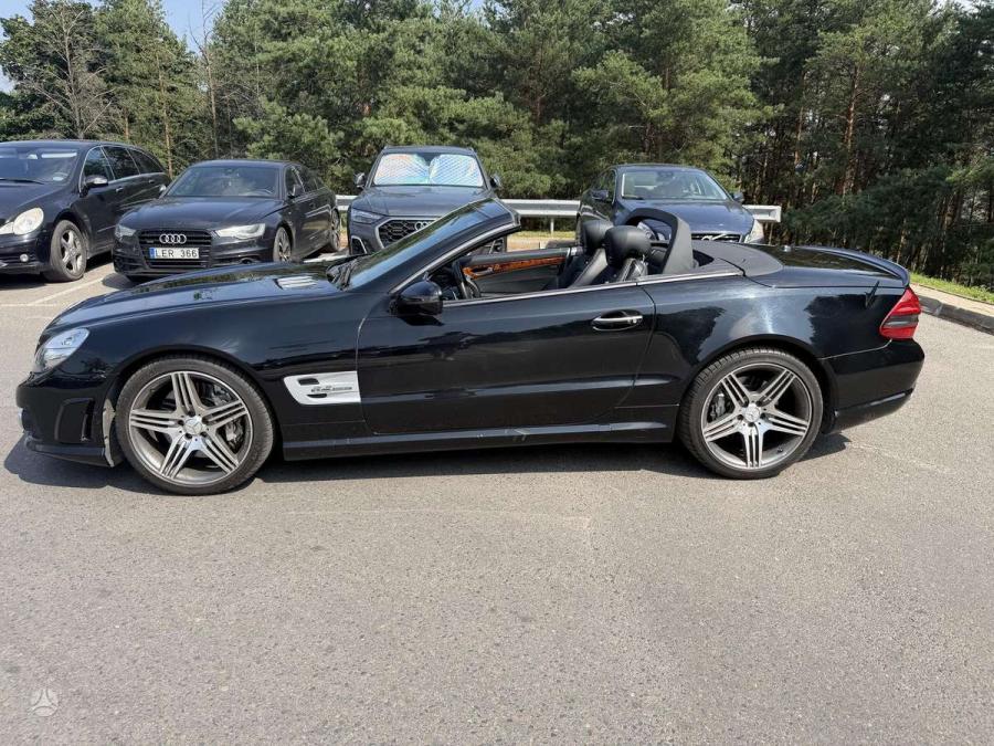 Black Mercedes-Benz SL 63 AMG 2009 in Vilnius, with an engine capacity of 6.21 L and mileage of 184 thousand km for 45000 €, photo 4 on AUTOMOTO.COM.LV