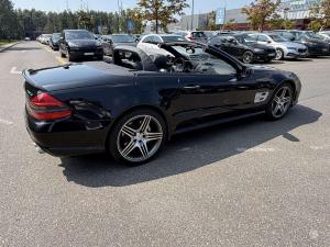 Black Mercedes-Benz SL 63 AMG 2009 in Vilnius, with an engine capacity of 6.21 L and mileage of 184 thousand km for 45000 €, photo 8 on AUTOMOTO.COM.LV