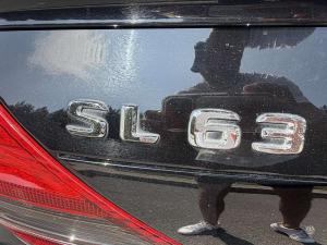 Black Mercedes-Benz SL 63 AMG 2009 in Vilnius, with an engine capacity of 6.21 L and mileage of 184 thousand km for 45000 €, photo 11 on AUTOMOTO.COM.LV