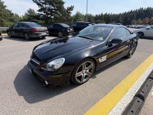 Black Mercedes-Benz SL 63 AMG 2009 in Vilnius, with an engine capacity of 6.21 L and mileage of 184 thousand km for 45000 €, photo 14 on AUTOMOTO.COM.LV