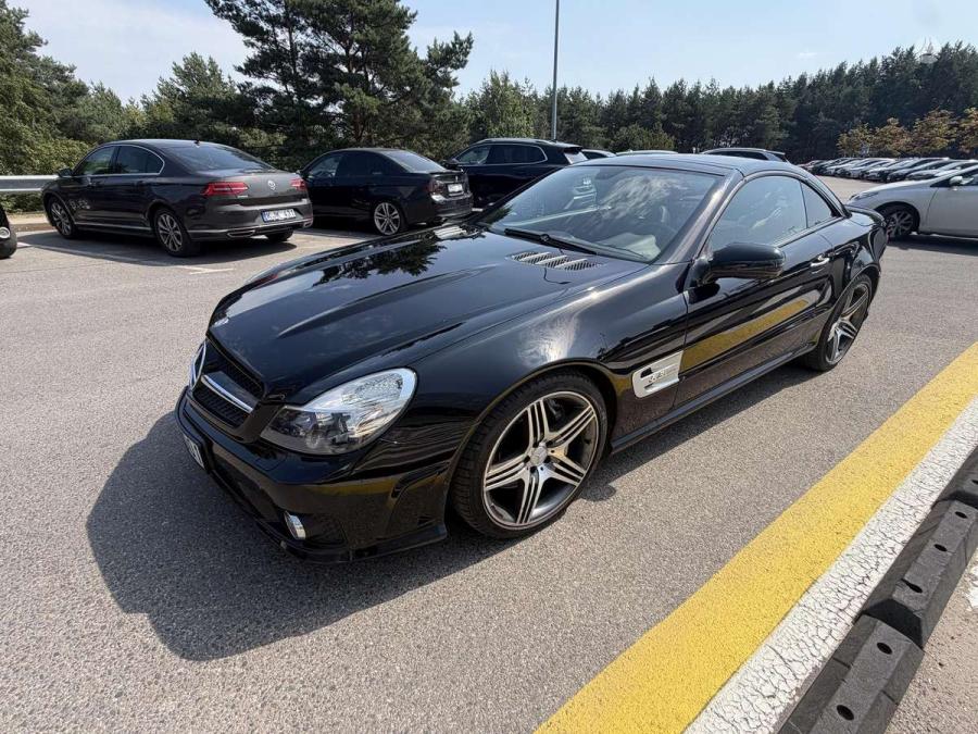 Black Mercedes-Benz SL 63 AMG 2009 in Vilnius, with an engine capacity of 6.21 L and mileage of 184 thousand km for 45000 €, photo 14 on AUTOMOTO.COM.LV