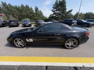 Black Mercedes-Benz SL 63 AMG 2009 in Vilnius, with an engine capacity of 6.21 L and mileage of 184 thousand km for 45000 €, photo 15 on AUTOMOTO.COM.LV