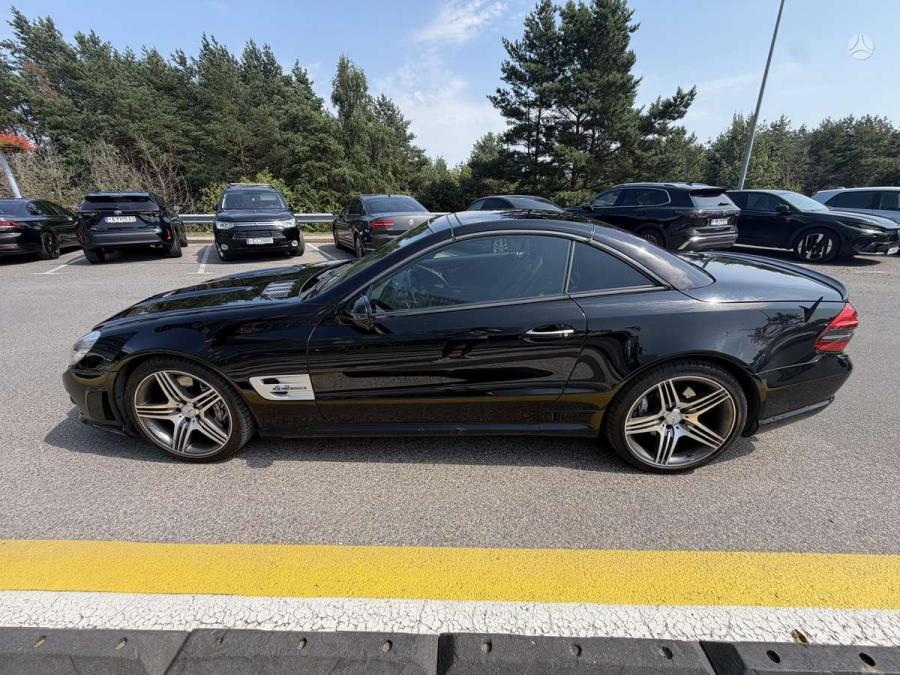 Black Mercedes-Benz SL 63 AMG 2009 in Vilnius, with an engine capacity of 6.21 L and mileage of 184 thousand km for 45000 €, photo 15 on AUTOMOTO.COM.LV