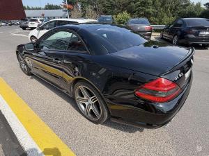 Black Mercedes-Benz SL 63 AMG 2009 in Vilnius, with an engine capacity of 6.21 L and mileage of 184 thousand km for 45000 €, photo 16 on AUTOMOTO.COM.LV