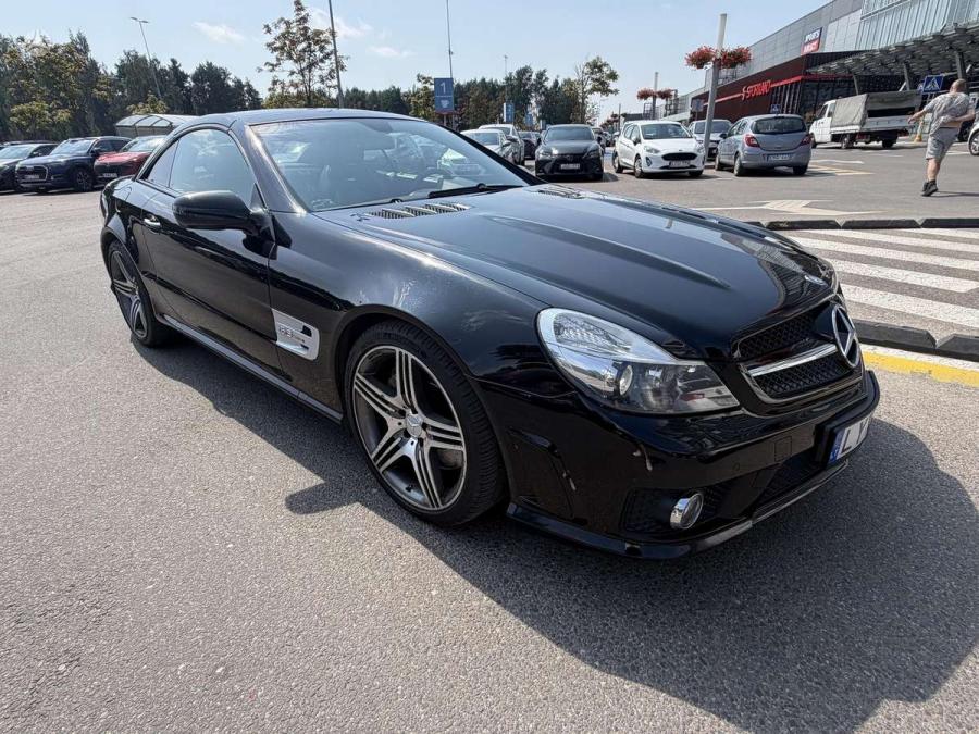 Black Mercedes-Benz SL 63 AMG 2009 in Vilnius, with an engine capacity of 6.21 L and mileage of 184 thousand km for 45000 €, photo 19 on AUTOMOTO.COM.LV