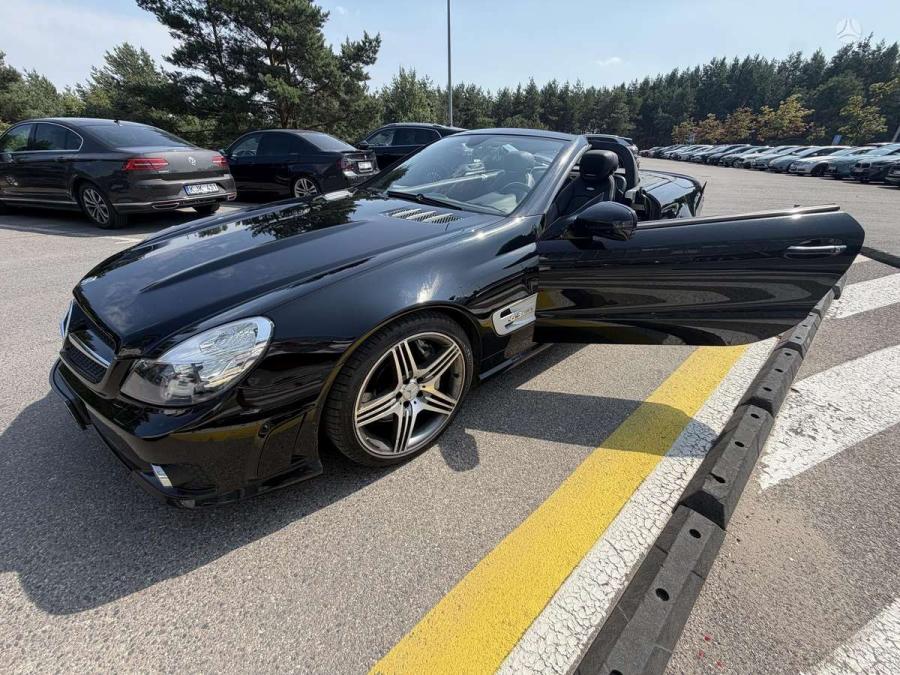 Black Mercedes-Benz SL 63 AMG 2009 in Vilnius, with an engine capacity of 6.21 L and mileage of 184 thousand km for 45000 €, photo 20 on AUTOMOTO.COM.LV