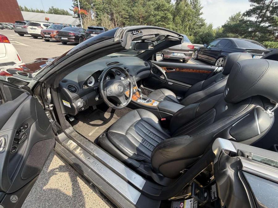 Black Mercedes-Benz SL 63 AMG 2009 in Vilnius, with an engine capacity of 6.21 L and mileage of 184 thousand km for 45000 €, photo 23 on AUTOMOTO.COM.LV