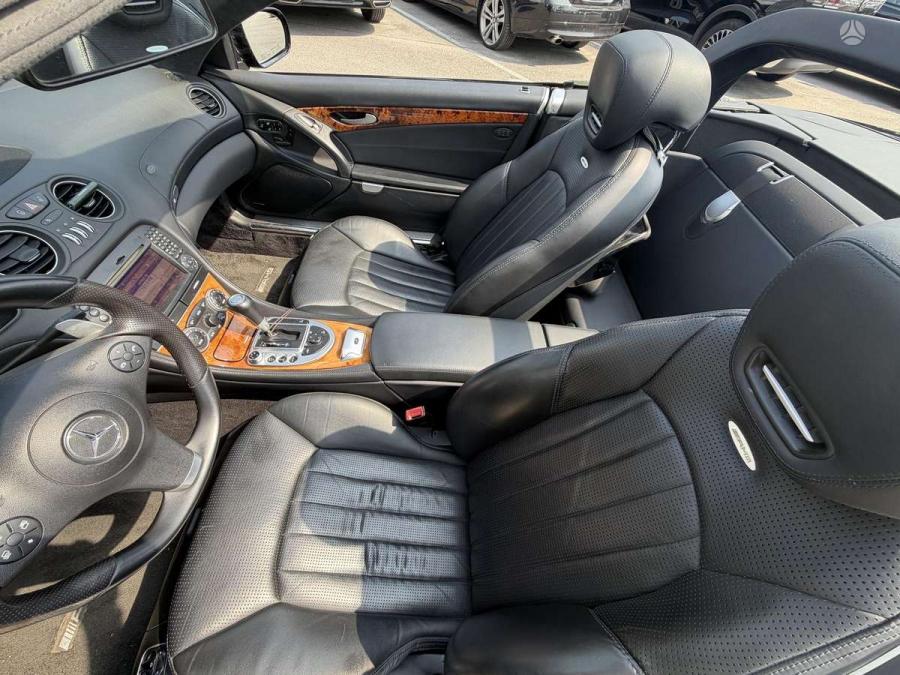 Black Mercedes-Benz SL 63 AMG 2009 in Vilnius, with an engine capacity of 6.21 L and mileage of 184 thousand km for 45000 €, photo 24 on AUTOMOTO.COM.LV
