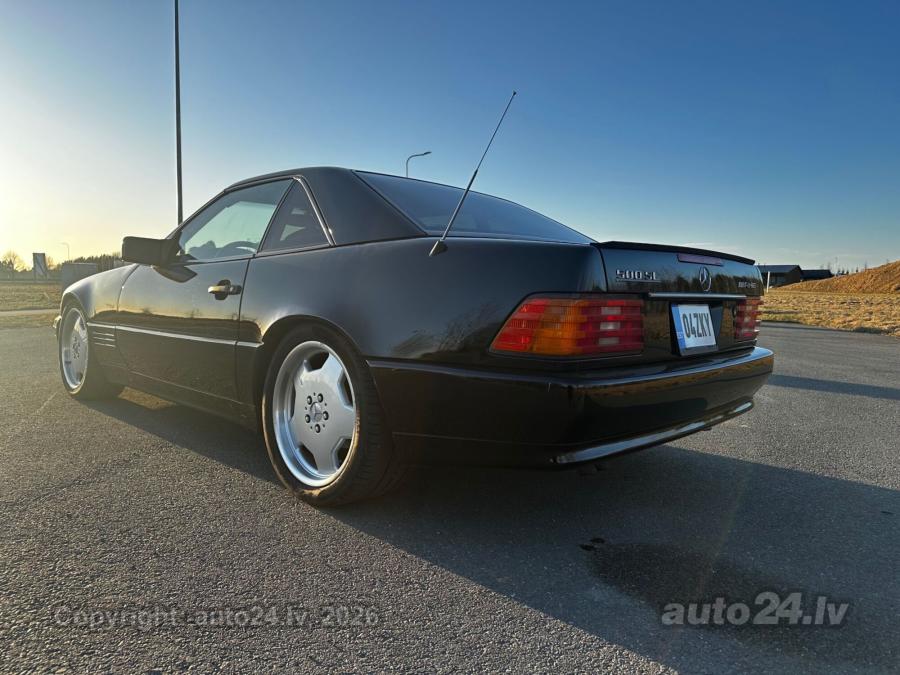 Black Mercedes-Benz SL-Class 1991 in Tallinn, with an engine capacity of 5.00 L and mileage of 169 thousand km for 10990 €, photo 12 on AUTOMOTO.COM.LV