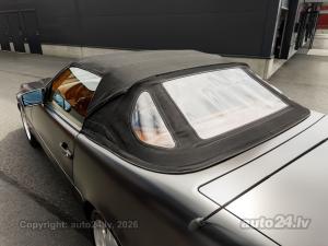 Black Mercedes-Benz SL-Class 1997 in Tallinn, with an engine capacity of 5.00 L and mileage of 159 thousand km for 28900 €, photo 4 on AUTOMOTO.COM.LV