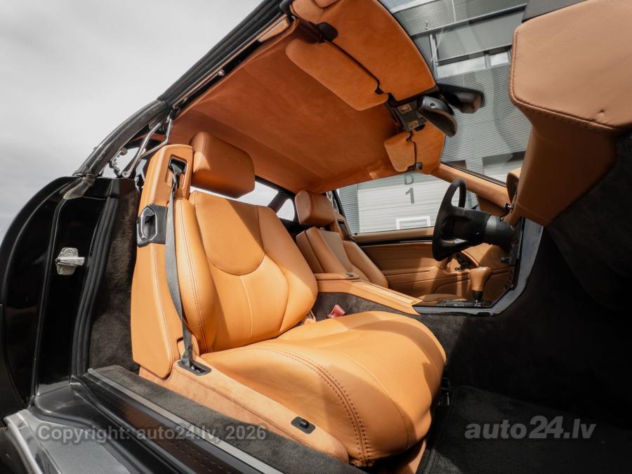 Black Mercedes-Benz SL-Class 1997 in Tallinn, with an engine capacity of 5.00 L and mileage of 159 thousand km for 28900 €, photo 10 on AUTOMOTO.COM.LV