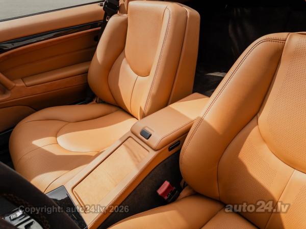 Black Mercedes-Benz SL-Class 1997 in Tallinn, with an engine capacity of 5.00 L and mileage of 159 thousand km for 28900 €, photo 10 on AUTOMOTO.COM.LV
