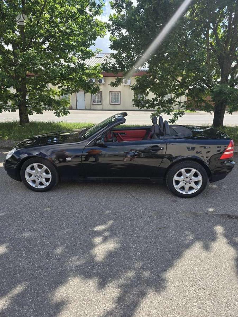 Black Mercedes-Benz SLK 200 1999 in Marijampole, with an engine capacity of 2.00 L and mileage of 220 thousand km for 3950 €, photo 1 on AUTOMOTO.COM.LV