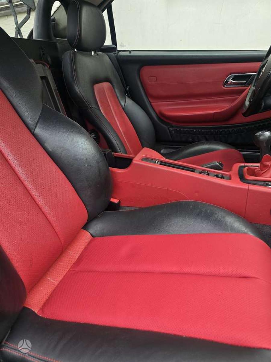 Black Mercedes-Benz SLK 200 1999 in Marijampole, with an engine capacity of 2.00 L and mileage of 220 thousand km for 3950 €, photo 16 on AUTOMOTO.COM.LV