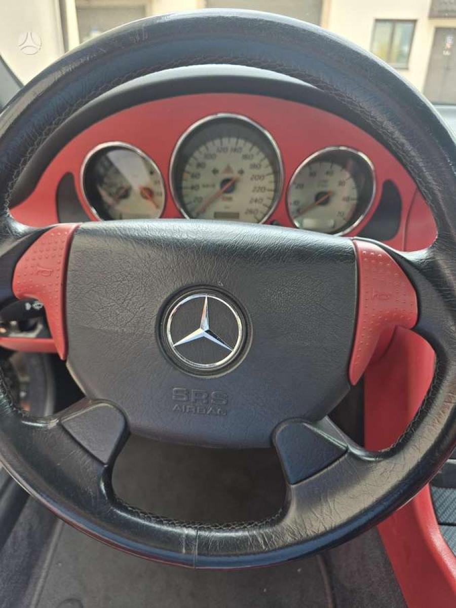 Black Mercedes-Benz SLK 200 1999 in Marijampole, with an engine capacity of 2.00 L and mileage of 220 thousand km for 3950 €, photo 21 on AUTOMOTO.COM.LV