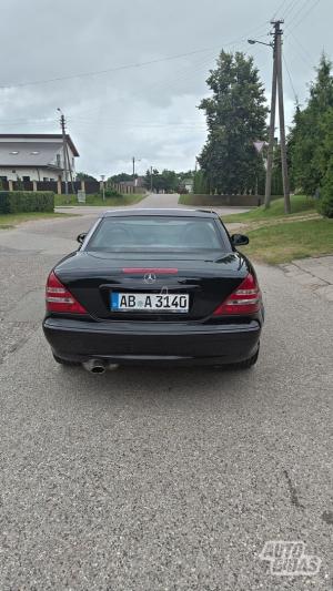 Melns Mercedes-Benz SLK 230 2000 Utena, ar dzinēja tilpumu 2.30 L un nobraukumu 169 tūkst. km par 4200 €, foto 6 vietnē AUTOMOTO.COM.LV