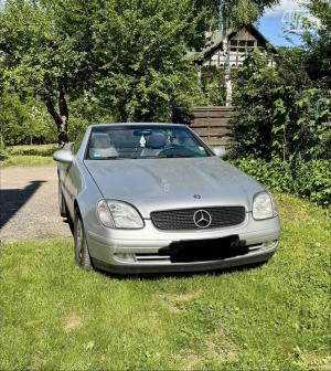 Pelēks Mercedes-Benz SLK 230 1999 Viļņa, ar dzinēja tilpumu 2.30 L un nobraukumu 215 tūkst. km par 2000 €, foto  vietnē AUTOMOTO.COM.LV