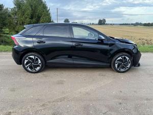 Black MG 4 EV 2023 in Kaunas, with an engine capacity of 0.00 L and mileage of 77 thousand km for 9650 €, photo 4 on AUTOMOTO.COM.LV