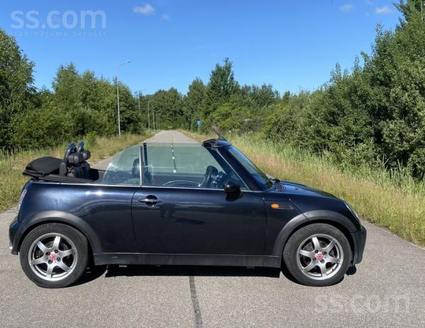 Black MINI Cabrio 2007 in Tukums, with an engine capacity of 1.60 L and mileage of 228 thousand km for 3690 €, photo 2 on AUTOMOTO.COM.LV