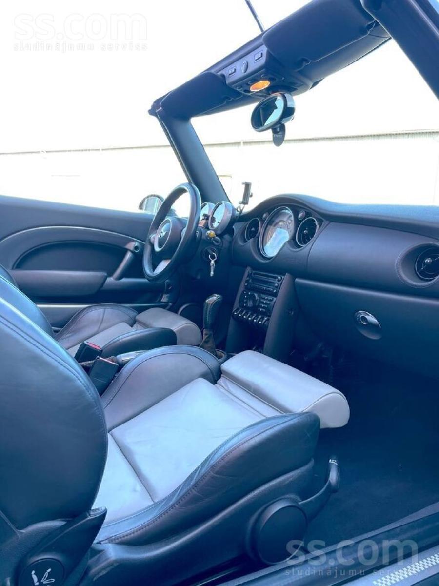 Black MINI Cabrio 2008 in Riga, with an engine capacity of 1.60 L and mileage of 265 thousand km for 5250 €, photo 11 on AUTOMOTO.COM.LV