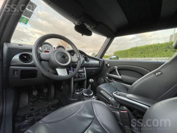 Blue MINI Cabrio 2008 in Riga, with an engine capacity of 1.60 L and mileage of 269 thousand km for 2999 €, photo 7 on AUTOMOTO.COM.LV
