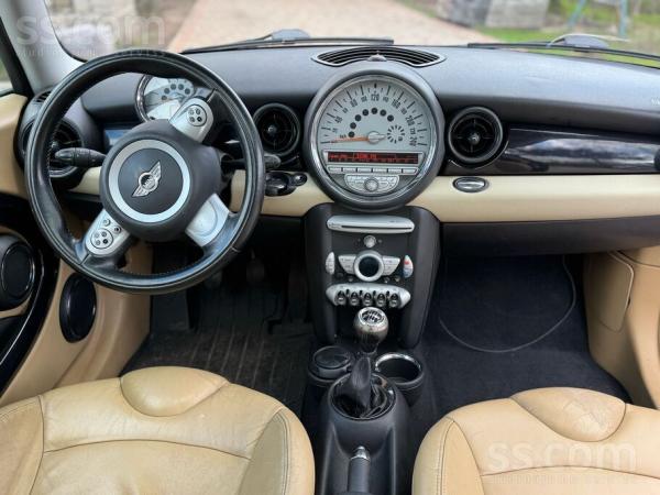 Black MINI Cooper 2006 in Riga, with an engine capacity of 1.60 L and mileage of 230 thousand km for 1795 €, photo 7 on AUTOMOTO.COM.LV