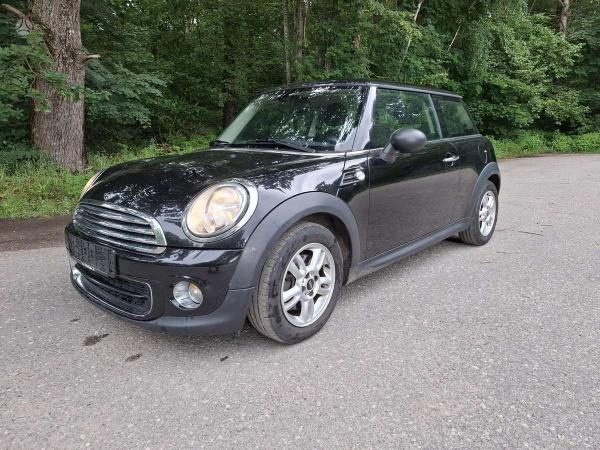 Black MINI Cooper 2011 in Alytus, with an engine capacity of 1.60 L and mileage of 242 thousand km for 3200 €, photo 1 on AUTOMOTO.COM.LV