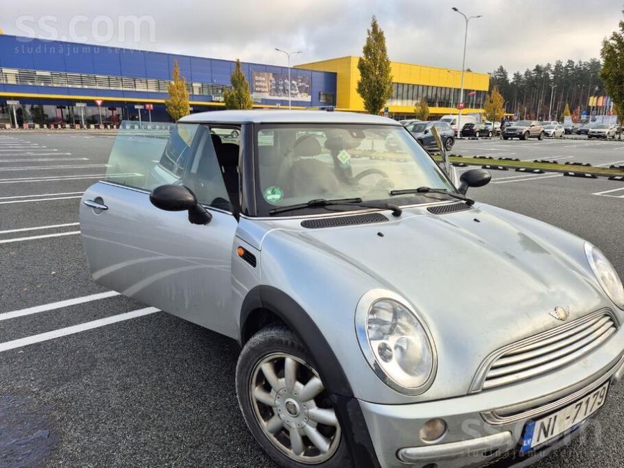 Blue MINI Cooper 2003 in Riga, with an engine capacity of 1.60 L and mileage of 256 thousand km for 1950 €, photo 3 on AUTOMOTO.COM.LV