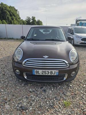 Brūns MINI Cooper 2011 Tauragė, ar dzinēja tilpumu 1.56 L un nobraukumu 155 tūkst. km par 4200 €, foto  vietnē AUTOMOTO.COM.LV