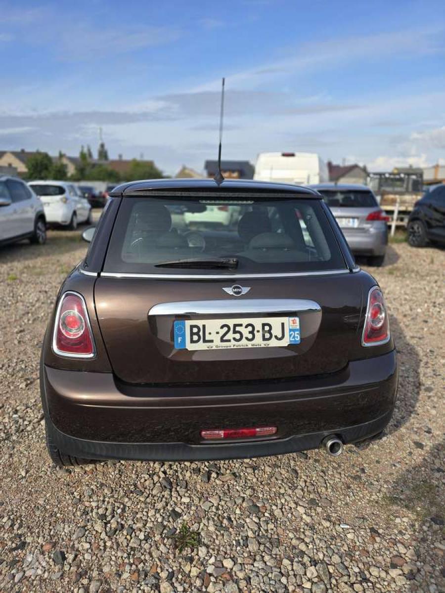 Brūns MINI Cooper 2011 Tauragė, ar dzinēja tilpumu 1.56 L un nobraukumu 155 tūkst. km par 4200 €, foto 6 vietnē AUTOMOTO.COM.LV