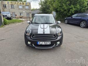 Brown MINI Cooper 2015 in Riga, with an engine capacity of 1.60 L and mileage of 283 thousand km for 9990 €, photo 4 on AUTOMOTO.COM.LV