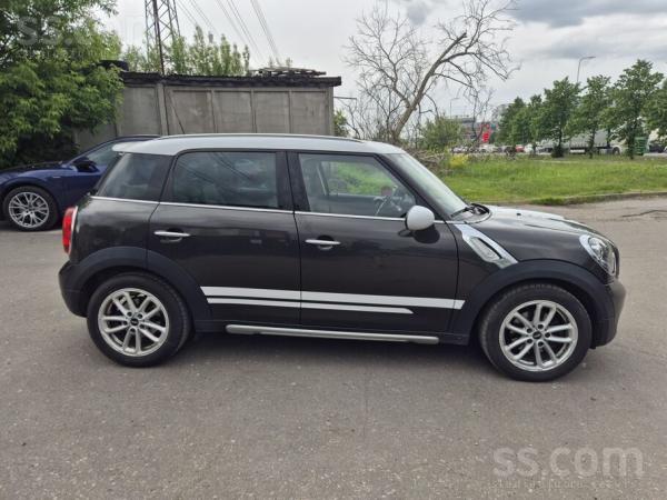 Brown MINI Cooper 2015 in Riga, with an engine capacity of 1.60 L and mileage of 283 thousand km for 9990 €, photo 5 on AUTOMOTO.COM.LV
