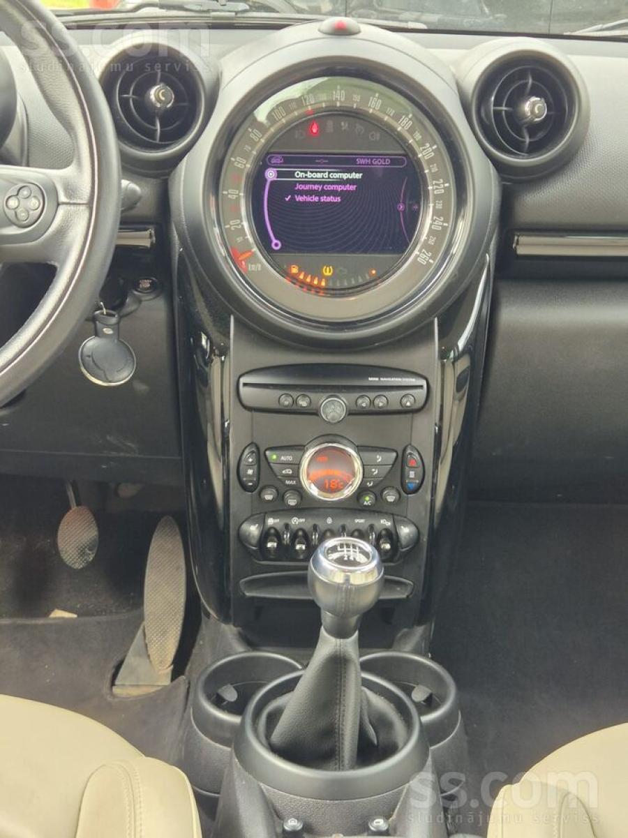 Brown MINI Cooper 2015 in Riga, with an engine capacity of 1.60 L and mileage of 283 thousand km for 9990 €, photo 12 on AUTOMOTO.COM.LV