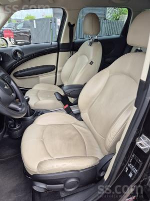 Brown MINI Cooper 2015 in Riga, with an engine capacity of 1.60 L and mileage of 283 thousand km for 9990 €, photo 13 on AUTOMOTO.COM.LV