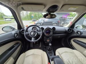 Brown MINI Cooper 2015 in Riga, with an engine capacity of 1.60 L and mileage of 283 thousand km for 9990 €, photo 17 on AUTOMOTO.COM.LV