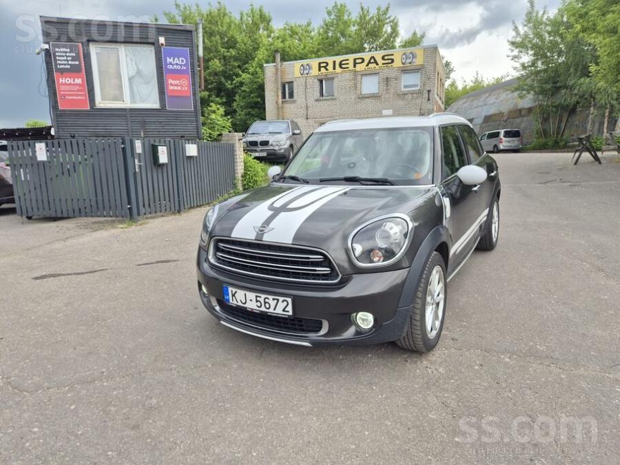 Brown MINI Cooper 2015 in Riga, with an engine capacity of 1.60 L and mileage of 283 thousand km for 9990 €, photo 1 on AUTOMOTO.COM.LV