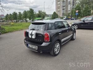 Brown MINI Cooper 2015 in Riga, with an engine capacity of 1.60 L and mileage of 283 thousand km for 9990 €, photo 6 on AUTOMOTO.COM.LV