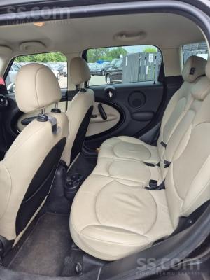 Brown MINI Cooper 2015 in Riga, with an engine capacity of 1.60 L and mileage of 283 thousand km for 9990 €, photo 10 on AUTOMOTO.COM.LV