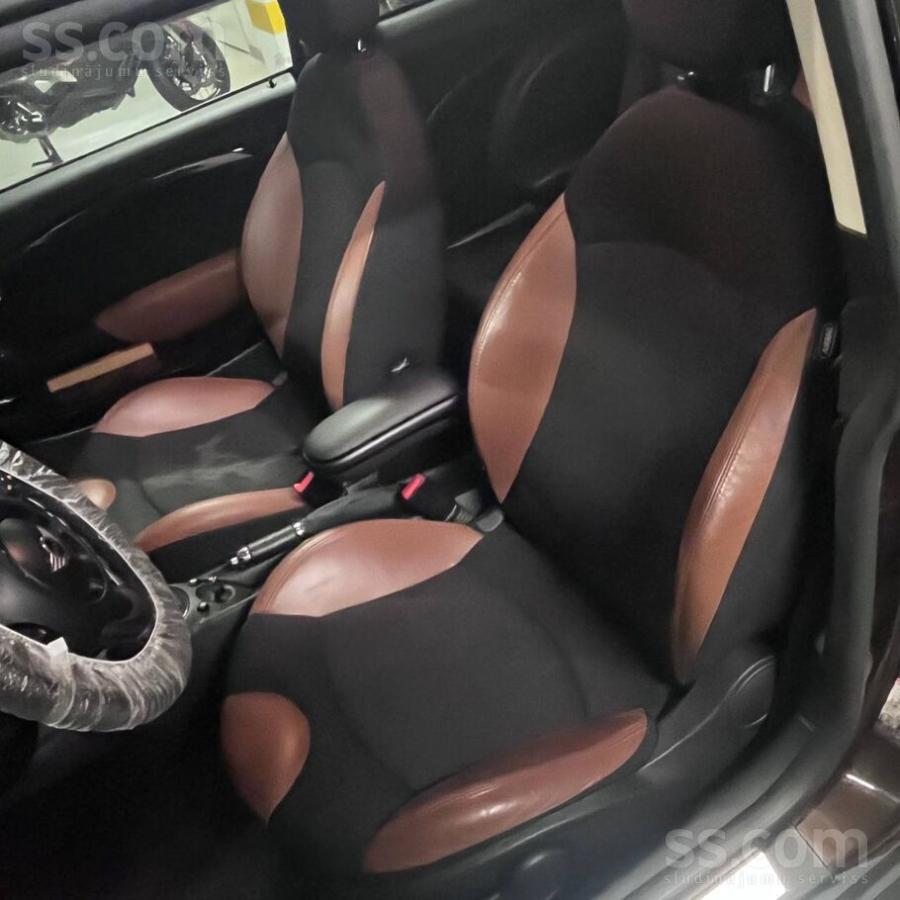 Brown MINI Cooper 2013 in Riga, with an engine capacity of 2.00 L and mileage of 128 thousand km for 9950 €, photo 7 on AUTOMOTO.COM.LV