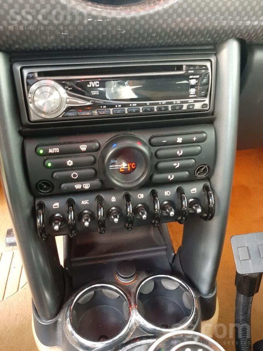 Green MINI Cooper 2006 in Riga, with an engine capacity of 1.60 L and mileage of 211 thousand km for 2950 €, photo 13 on AUTOMOTO.COM.LV