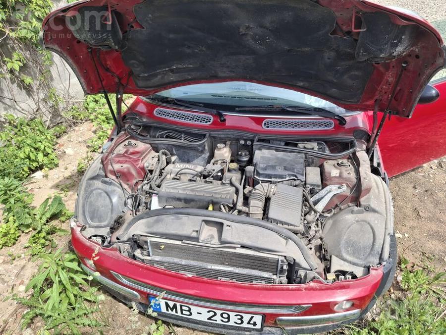 Sarkans MINI Cooper 2002 Rīga, ar dzinēja tilpumu 1.60 L un nobraukumu 280 tūkst. km par 990 €, foto 6 vietnē AUTOMOTO.COM.LV