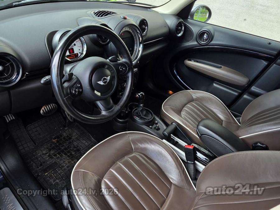 Blue MINI Cooper SD 2014 in Viljandi, with an engine capacity of 2.00 L and mileage of 226 thousand km for 8499 €, photo 16 on AUTOMOTO.COM.LV