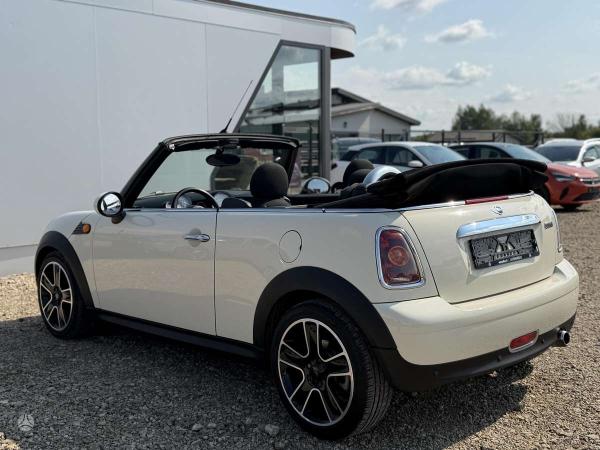 White MINI Cooper 2009 in Siauliai, with an engine capacity of 1.60 L and mileage of 132 thousand km for 4499 €, photo 6 on AUTOMOTO.COM.LV