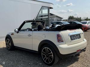 White MINI Cooper 2009 in Siauliai, with an engine capacity of 1.60 L and mileage of 132 thousand km for 4499 €, photo 7 on AUTOMOTO.COM.LV