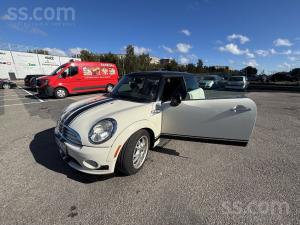 White MINI Cooper 2011 in Riga, with an engine capacity of 1.60 L and mileage of 180 thousand km for 4499 €, photo 3 on AUTOMOTO.COM.LV