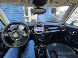 White MINI Cooper 2011 in Riga, with an engine capacity of 1.60 L and mileage of 180 thousand km for 4499 €, photo 13 on AUTOMOTO.COM.LV