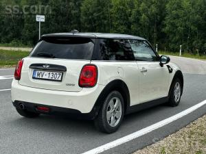White MINI Cooper 2015 in Riga, with an engine capacity of 1.50 L and mileage of 87 thousand km for 9950 €, photo 6 on AUTOMOTO.COM.LV