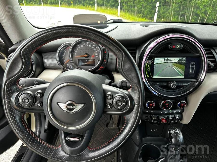 White MINI Cooper 2015 in Riga, with an engine capacity of 1.50 L and mileage of 87 thousand km for 9950 €, photo 8 on AUTOMOTO.COM.LV